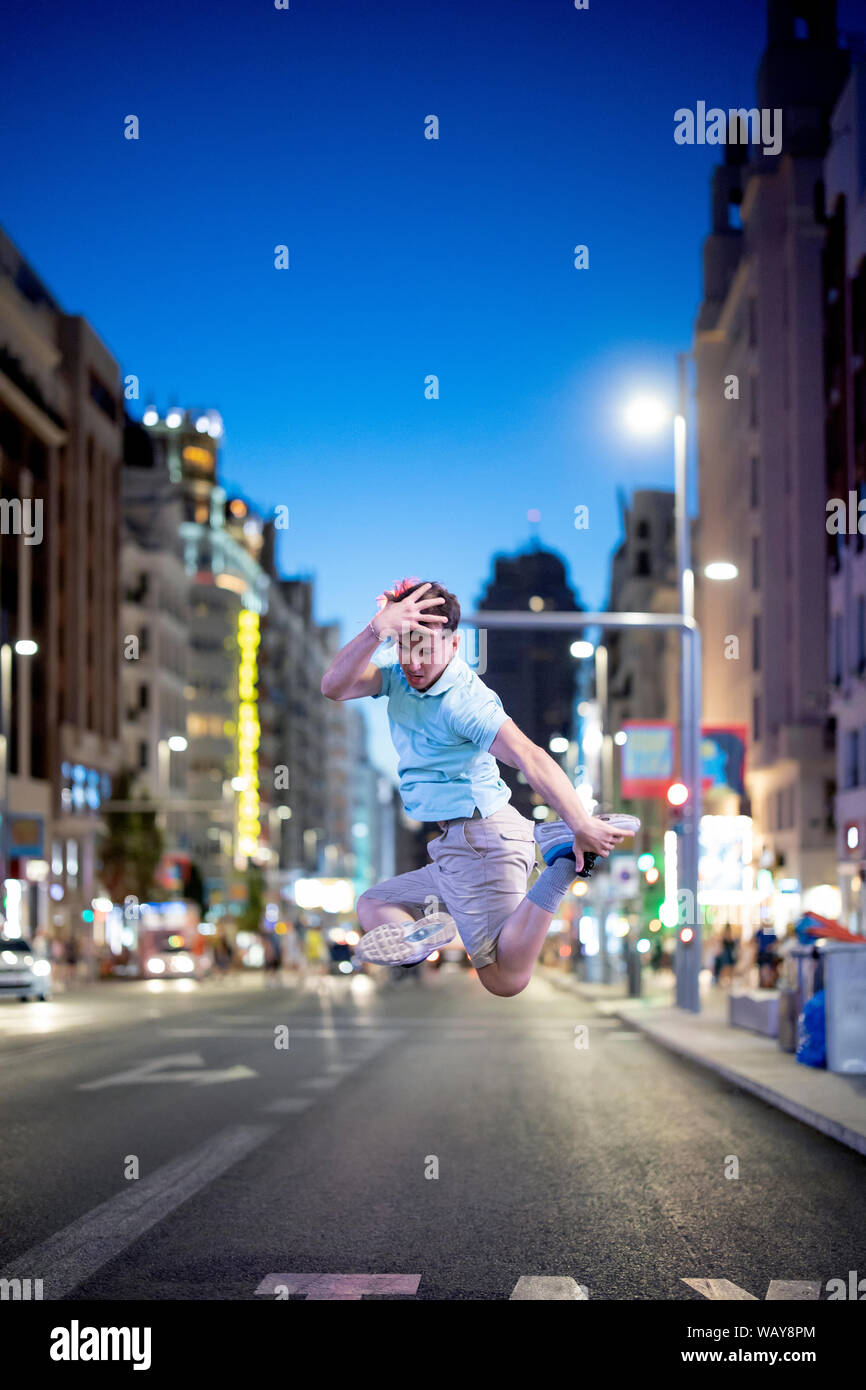 A young man dancing break dance on the night city road Stock Photo - Alamy