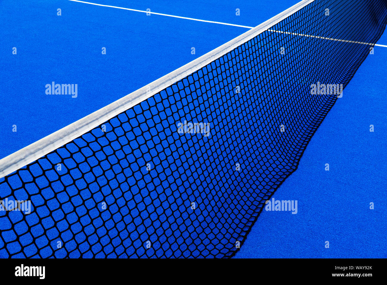 Detail of a Blue Tennis court with black net on Outdoor Stock Photo - Alamy