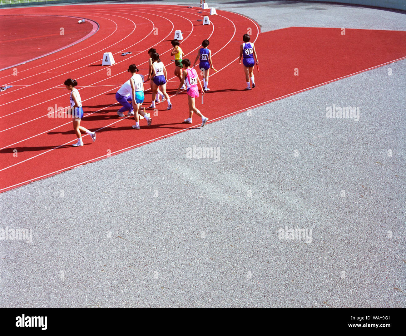 Group of Girls on Running Track Stock Photo - Alamy