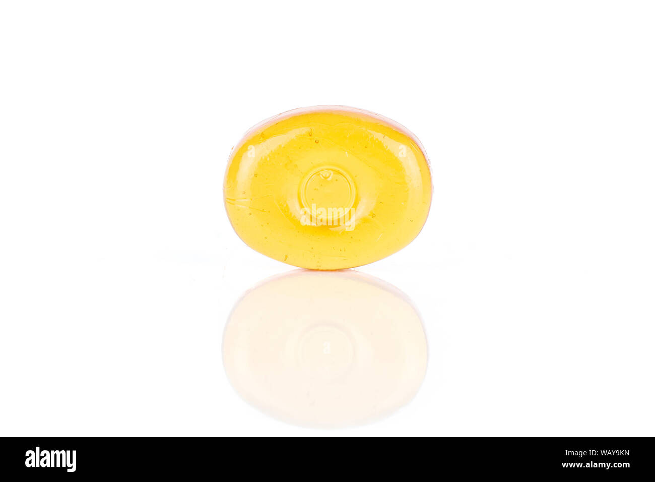 One whole orange colourful hard candy isolated on white background ...