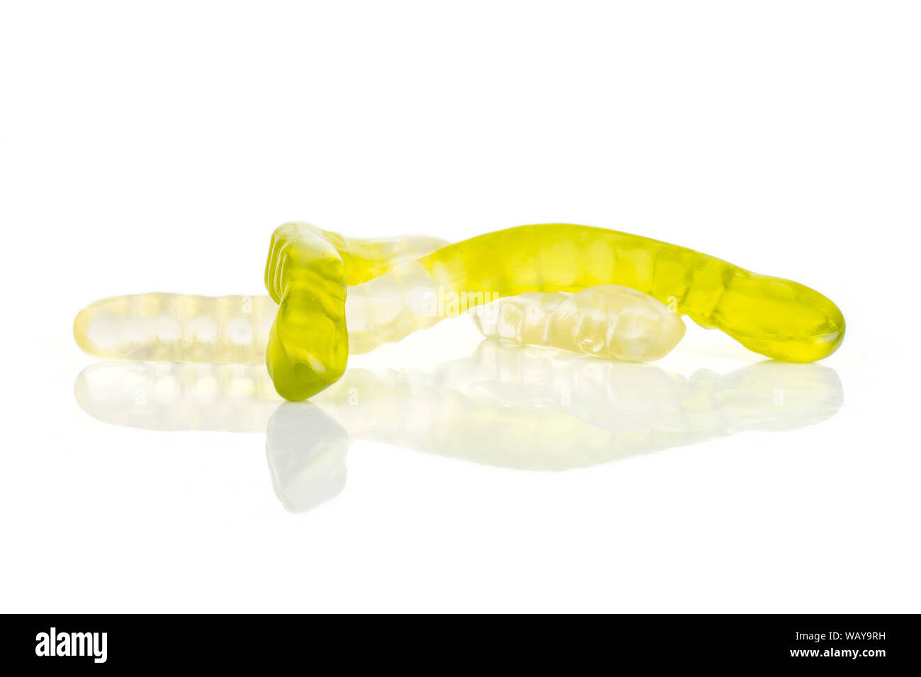 Group of two whole colourful jelly worm candy green white isolated on ...