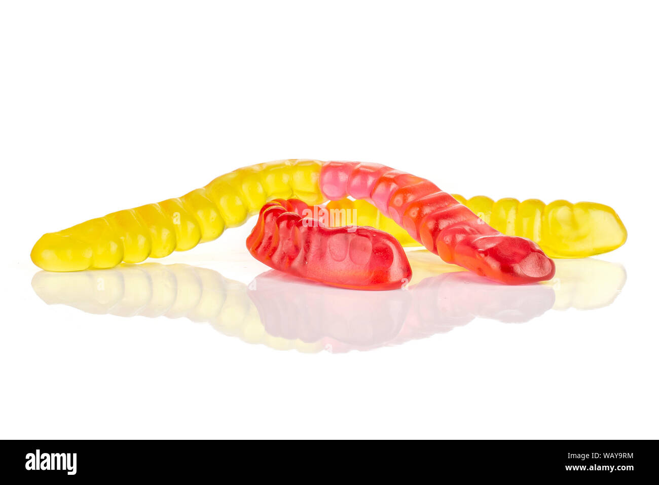 Group of three whole red yellow colourful jelly worm candy isolated on ...