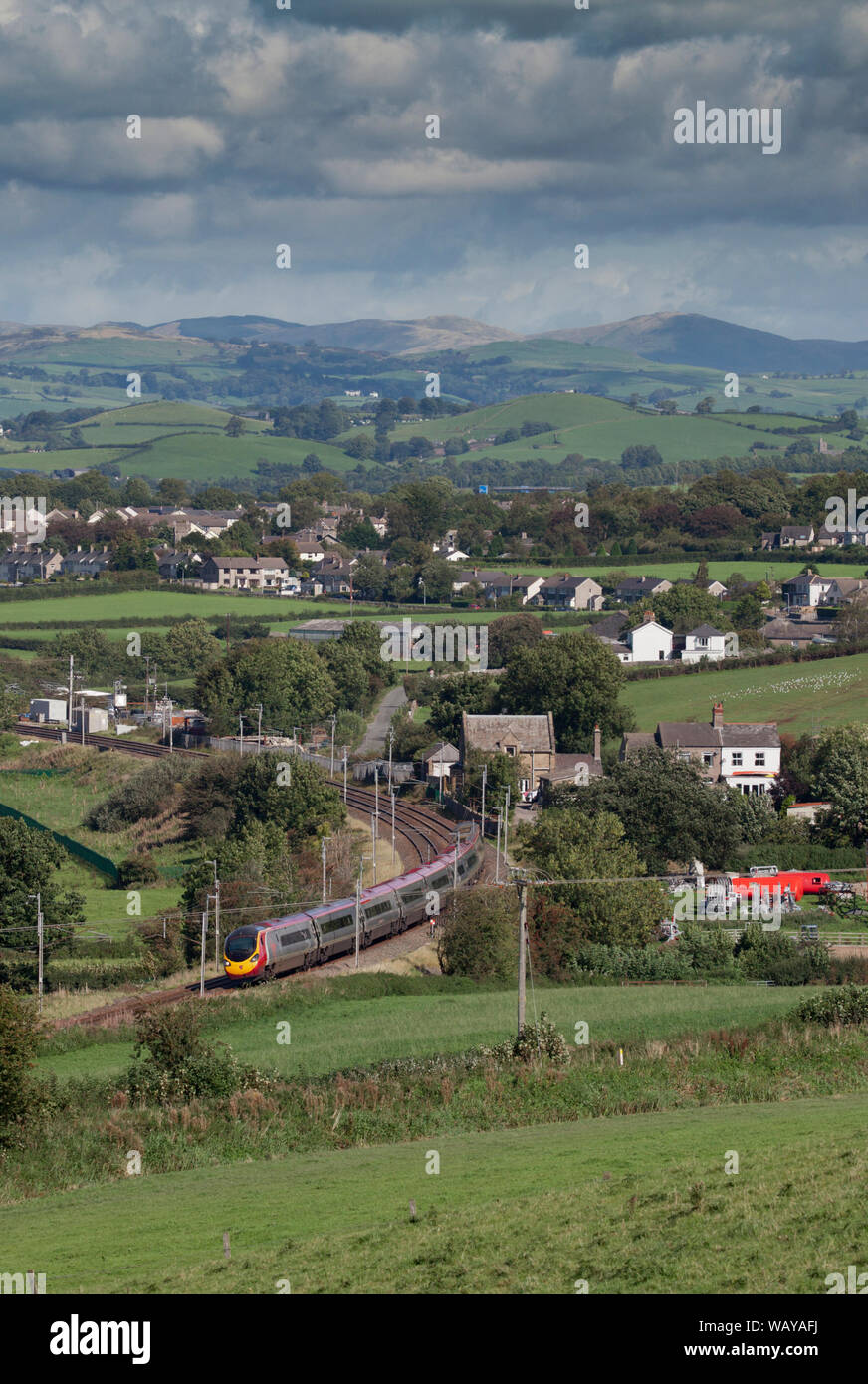 Virgin trains class 390 Pendolino on the west coast mainline at Burton ...