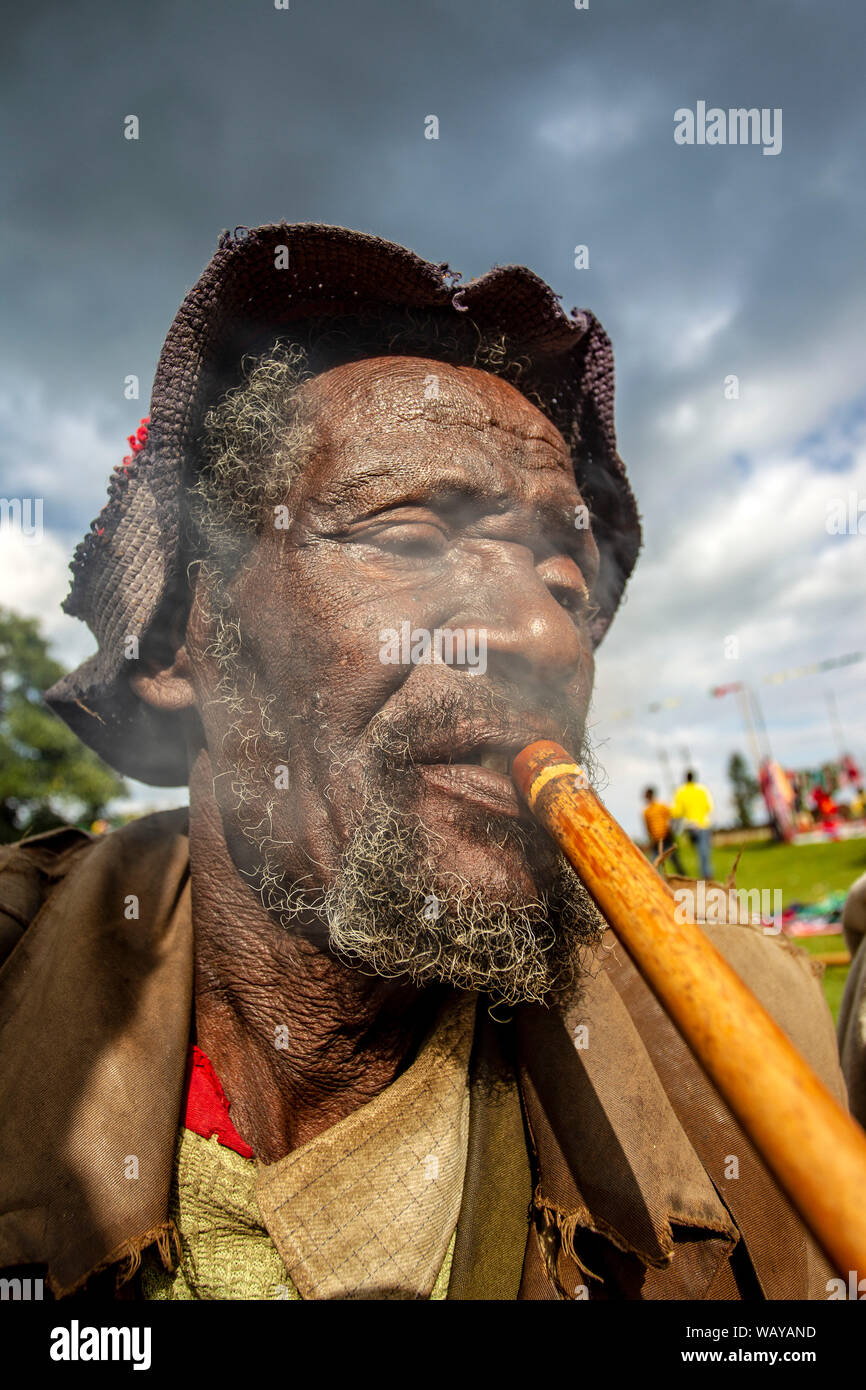Indigenous man smokes traditional hi-res stock photography and images ...