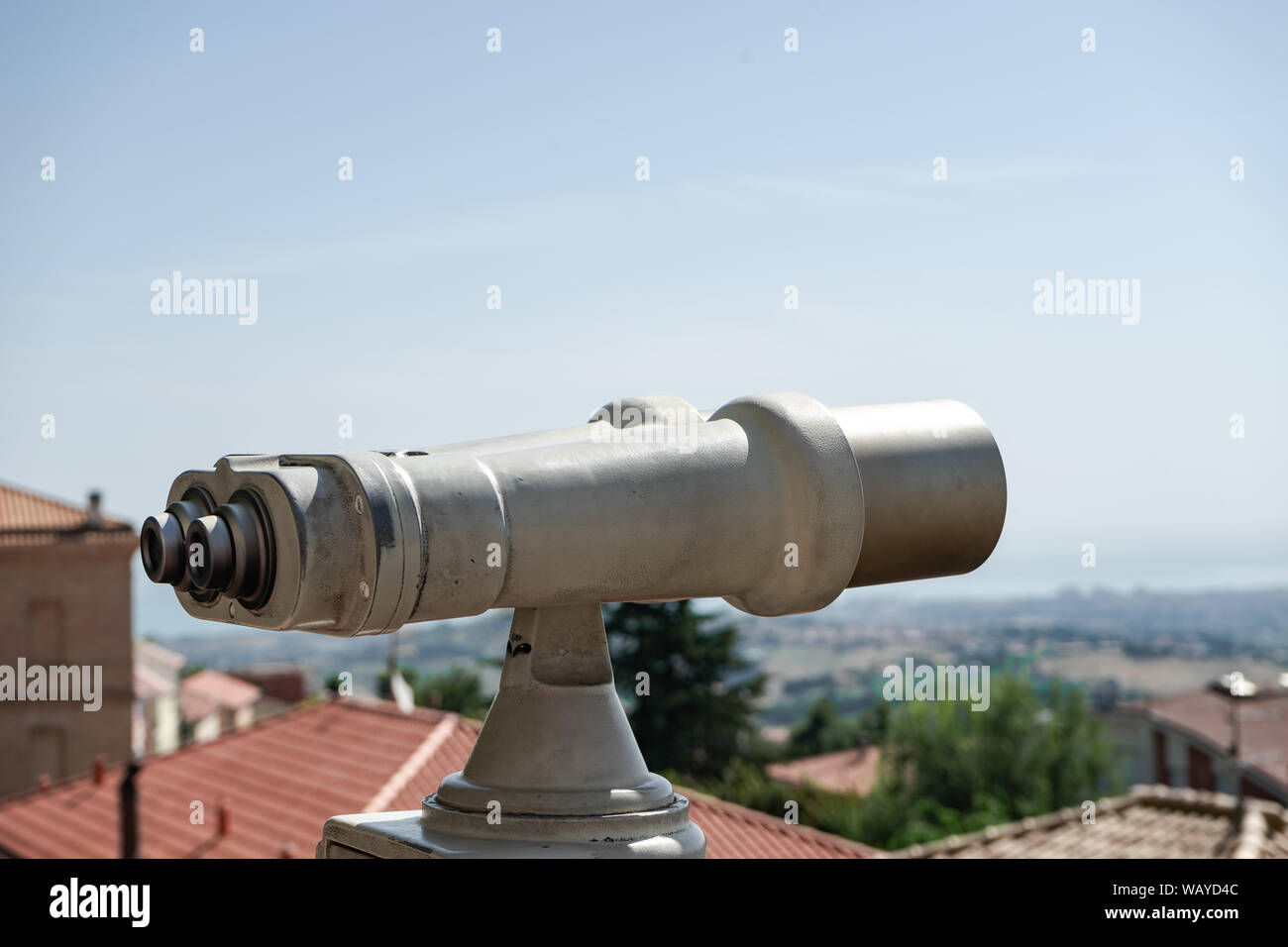 Binoculars look at the city with view city, closeup binocular on ...