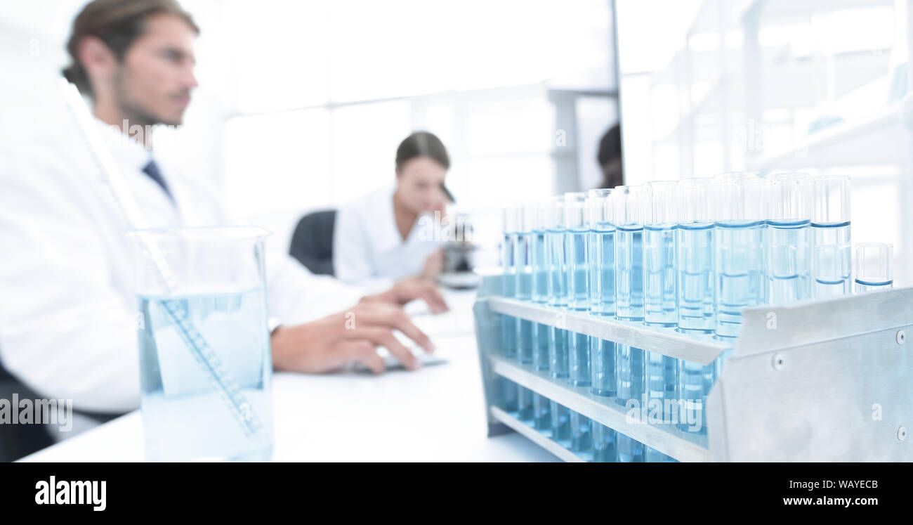 side view of scientists working in laboratory Stock Photo - Alamy