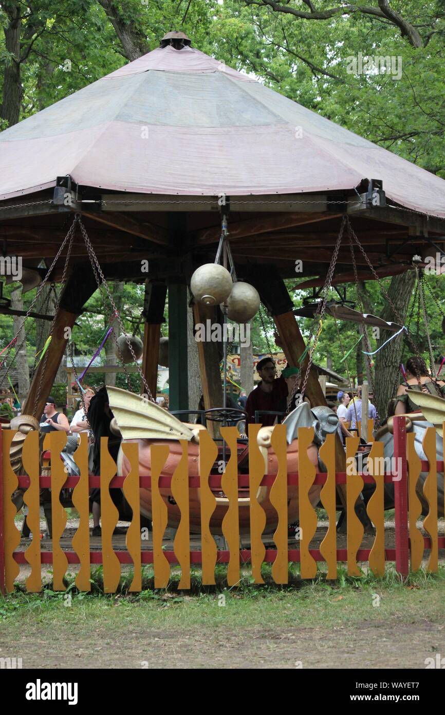 A manual spinning carnival ride at the Bristol Renaissance Faire, feire ...