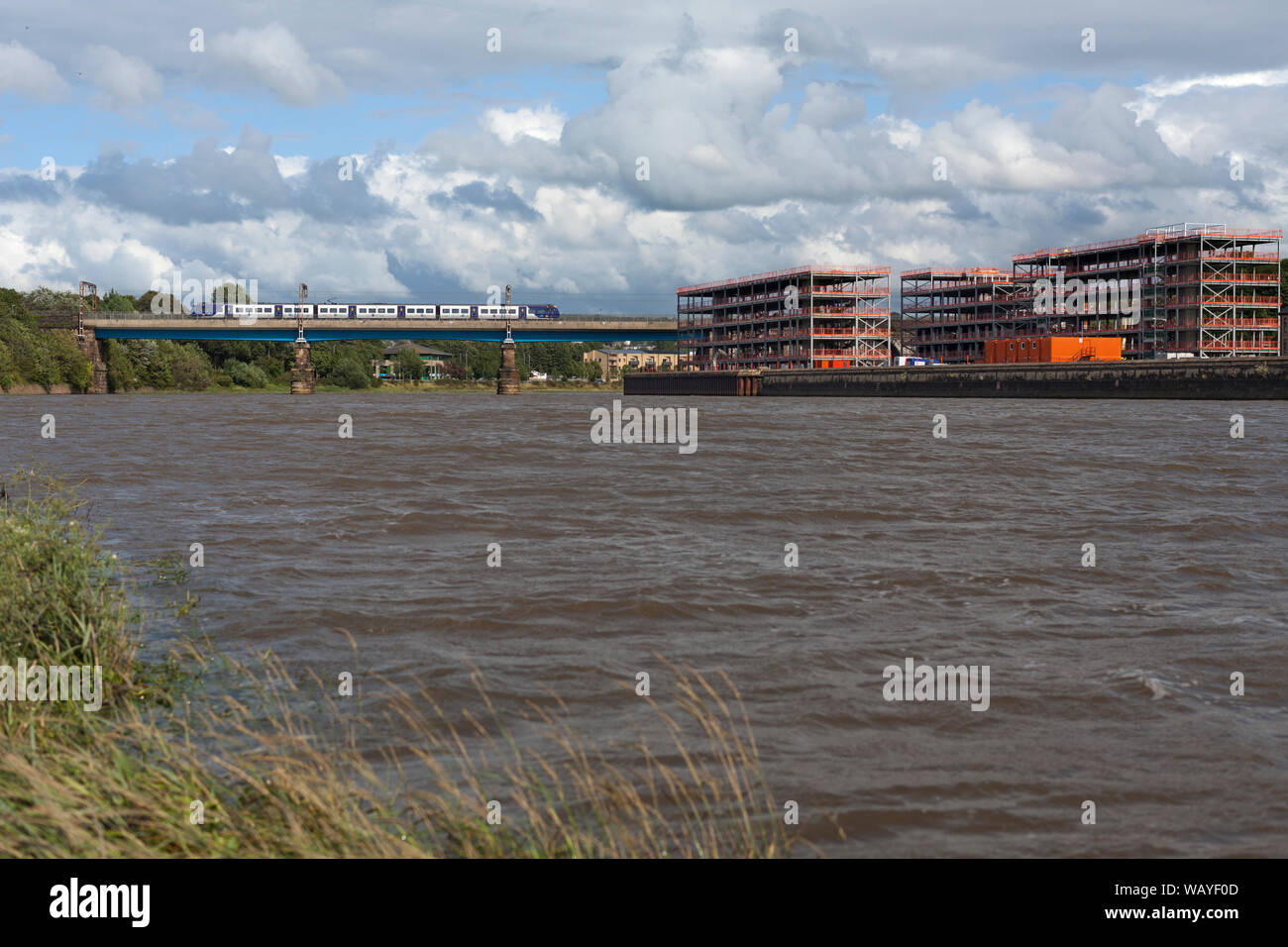 Arriva Northern rail class 331 electric train crossing Carlisle Bridge ...