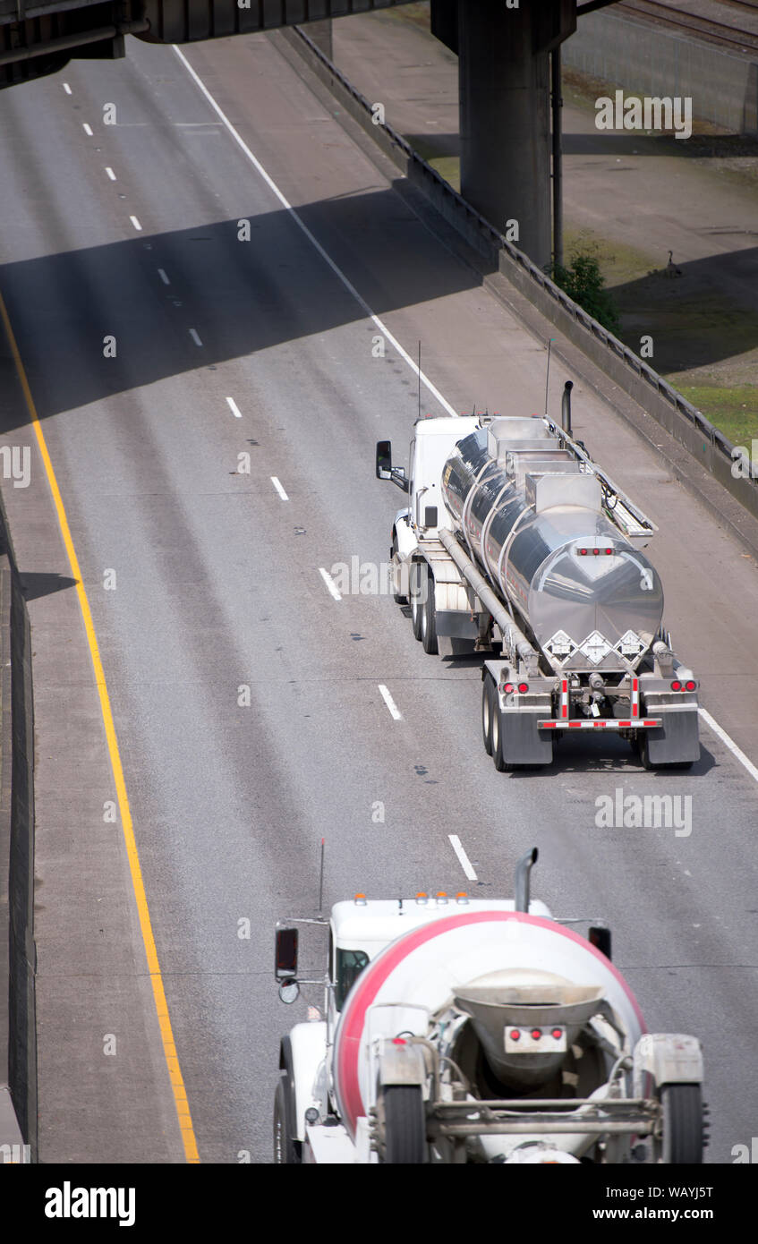 Big rig day cab white semi truck for local delivery transports liquid ...