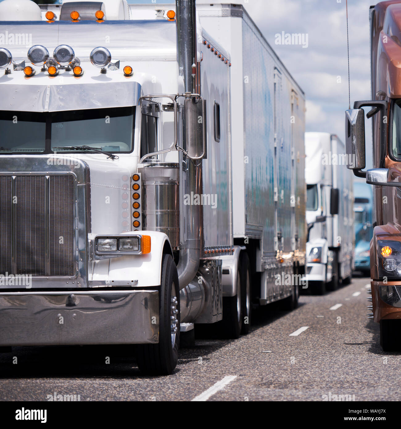 Convoy of different makes and models professional industrial grade long ...