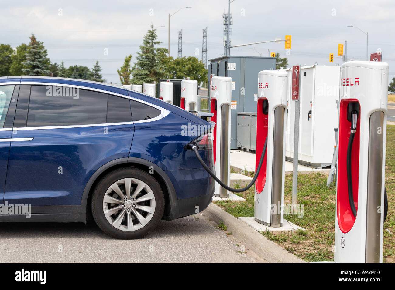 Blue tesla model plugged hi-res stock photography and images - Alamy