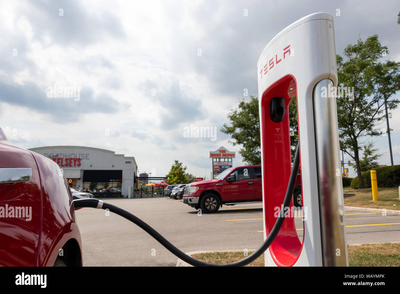 Tesla Supercharger Stall seen while Tesla Model S plugged-in and ...