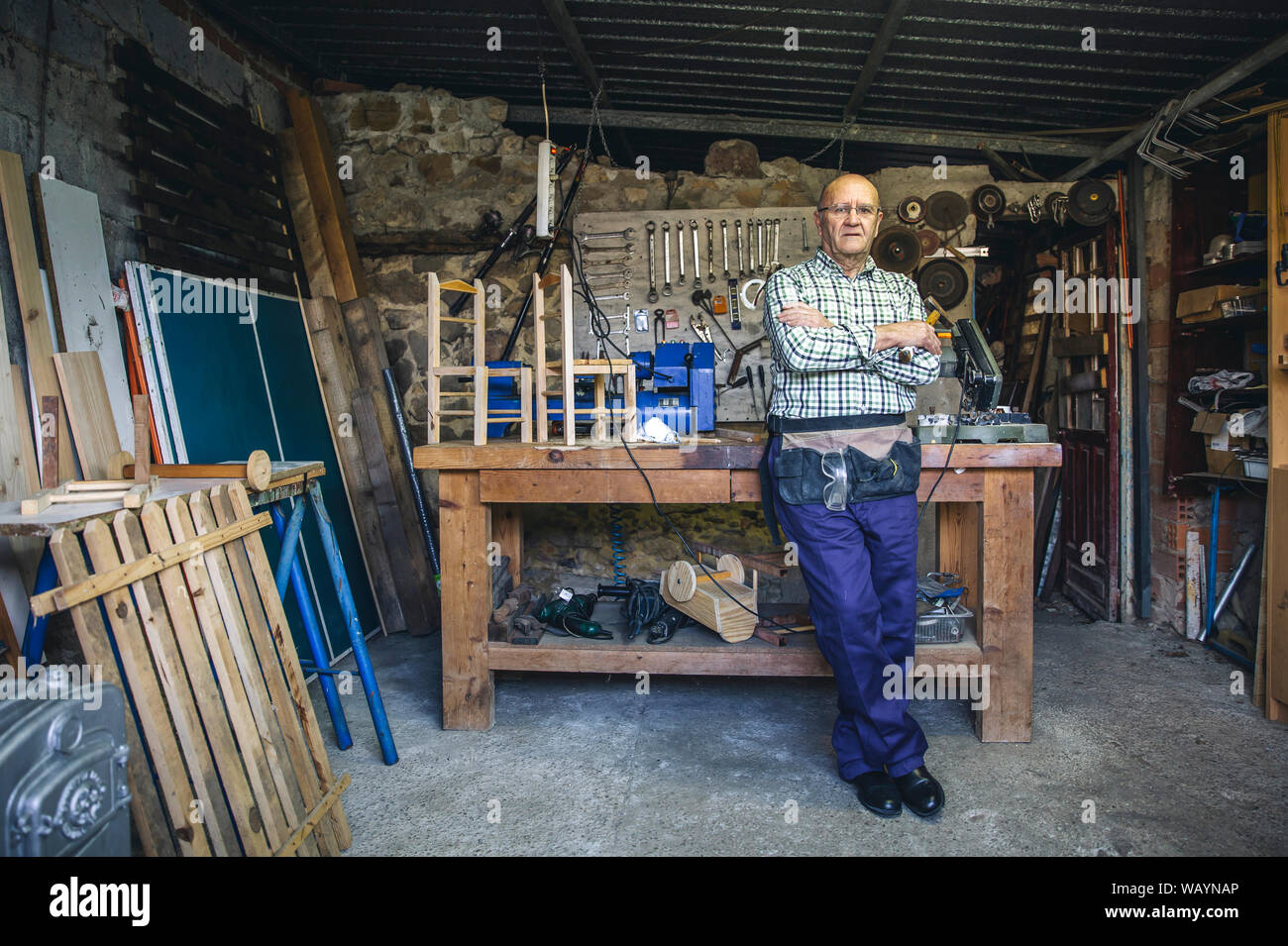 Carpenter in his workshop Stock Photo - Alamy