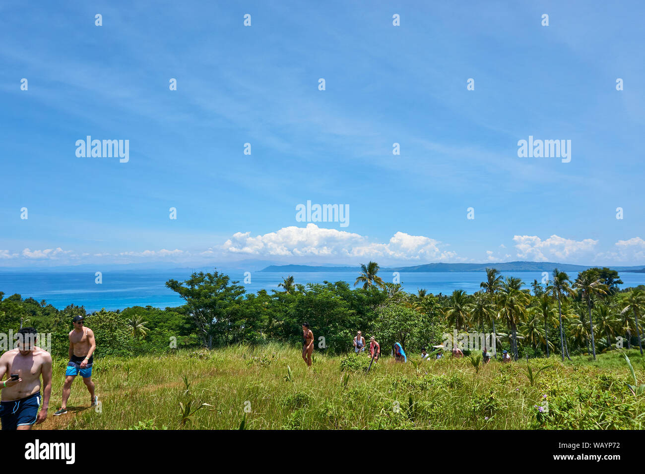 Philippines, Siargao Island, 20.July2019 People trekking on island in ...