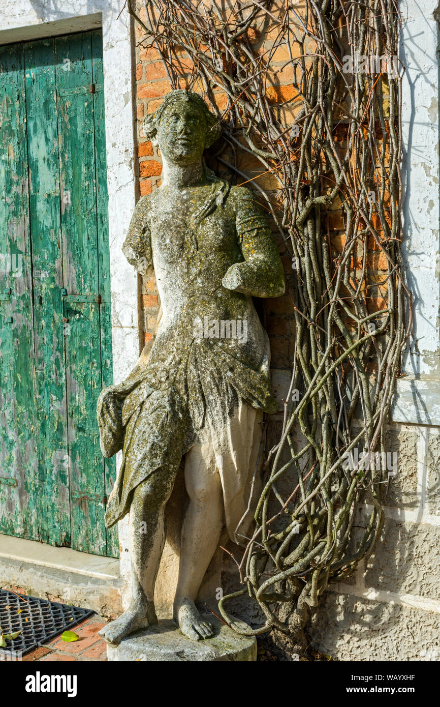 Old statue stone vertical hi-res stock photography and images - Alamy