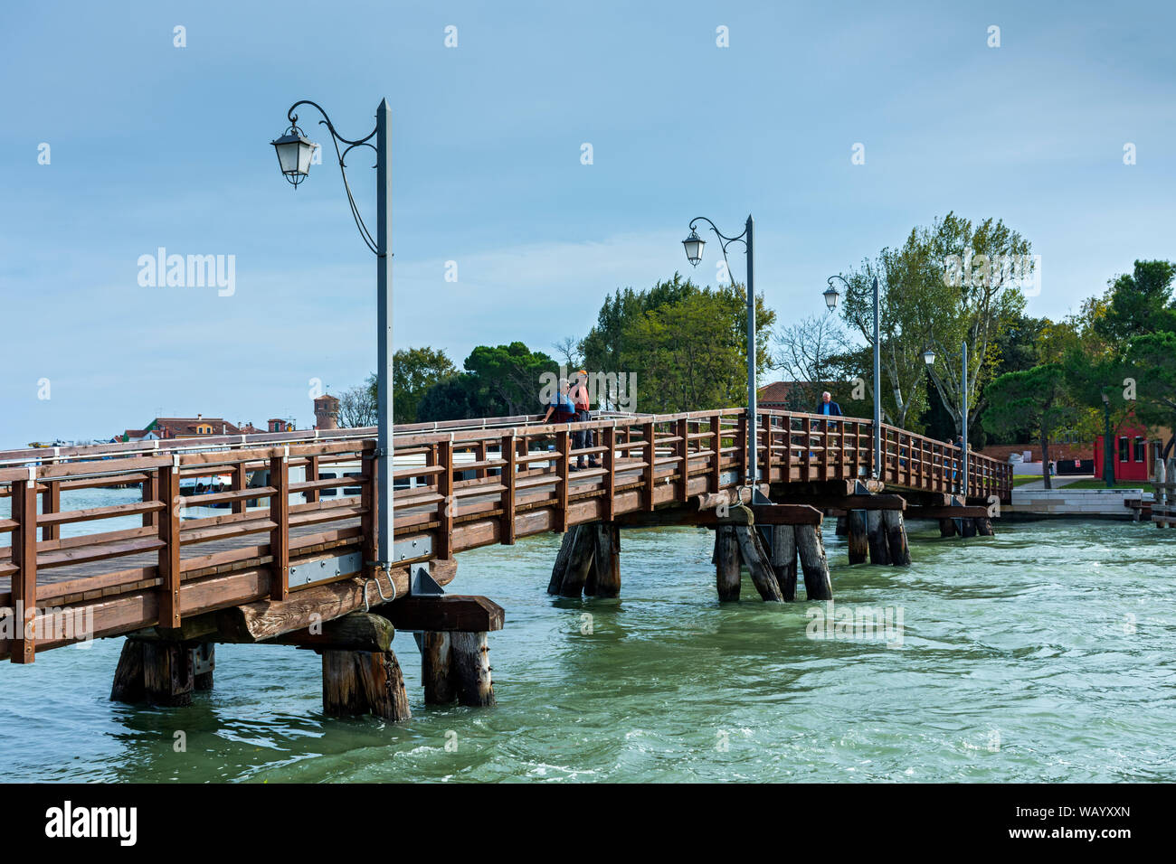 The wooden bridge linking the islands of Mazzorbo and Burano, Laguna ...