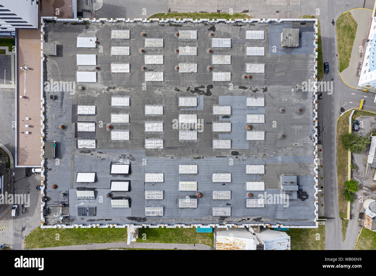 aerial top view of industrial building - factory or warehouse. city ...
