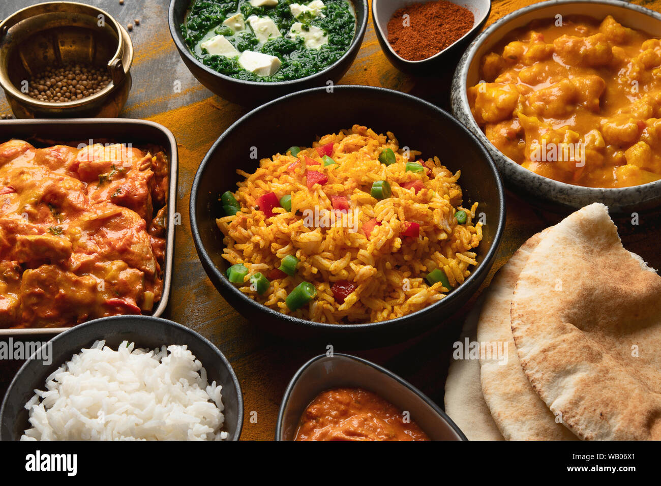 Assorted indian food on black background.. Indian cuisine. Top view ...