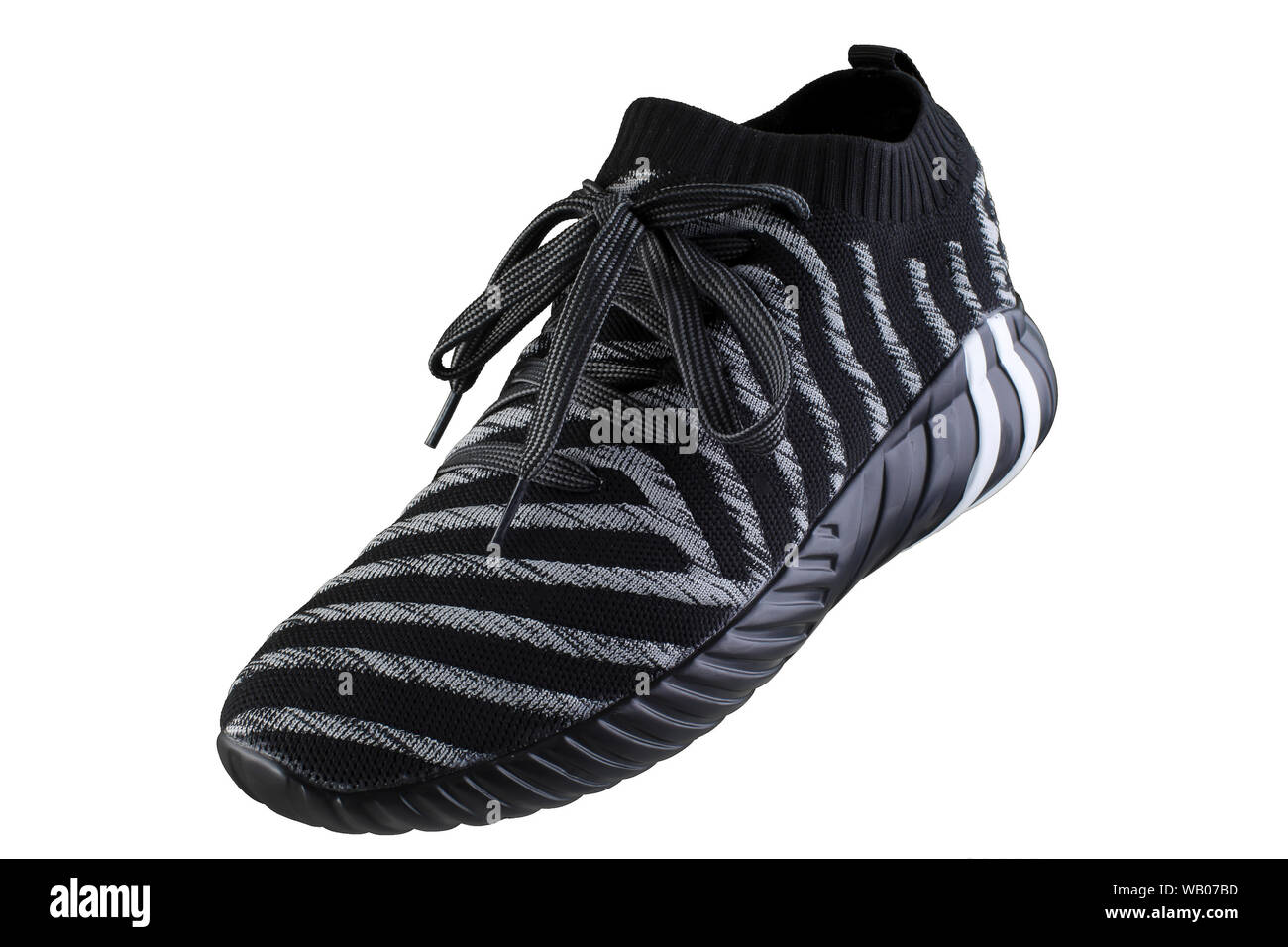 Sneakers. Sports shoes side view on a white background Stock Photo - Alamy