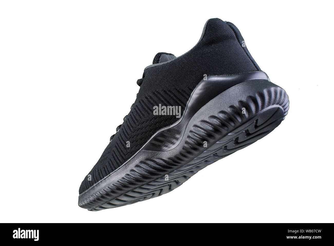 Sneakers. Sports shoes side view on a white background Stock Photo - Alamy