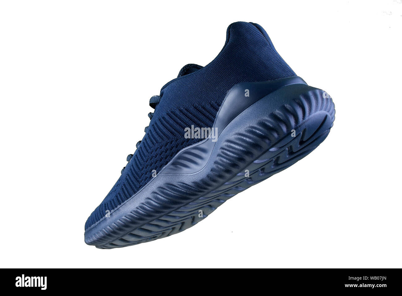 Sneakers. Sports shoes side view on a white background Stock Photo - Alamy