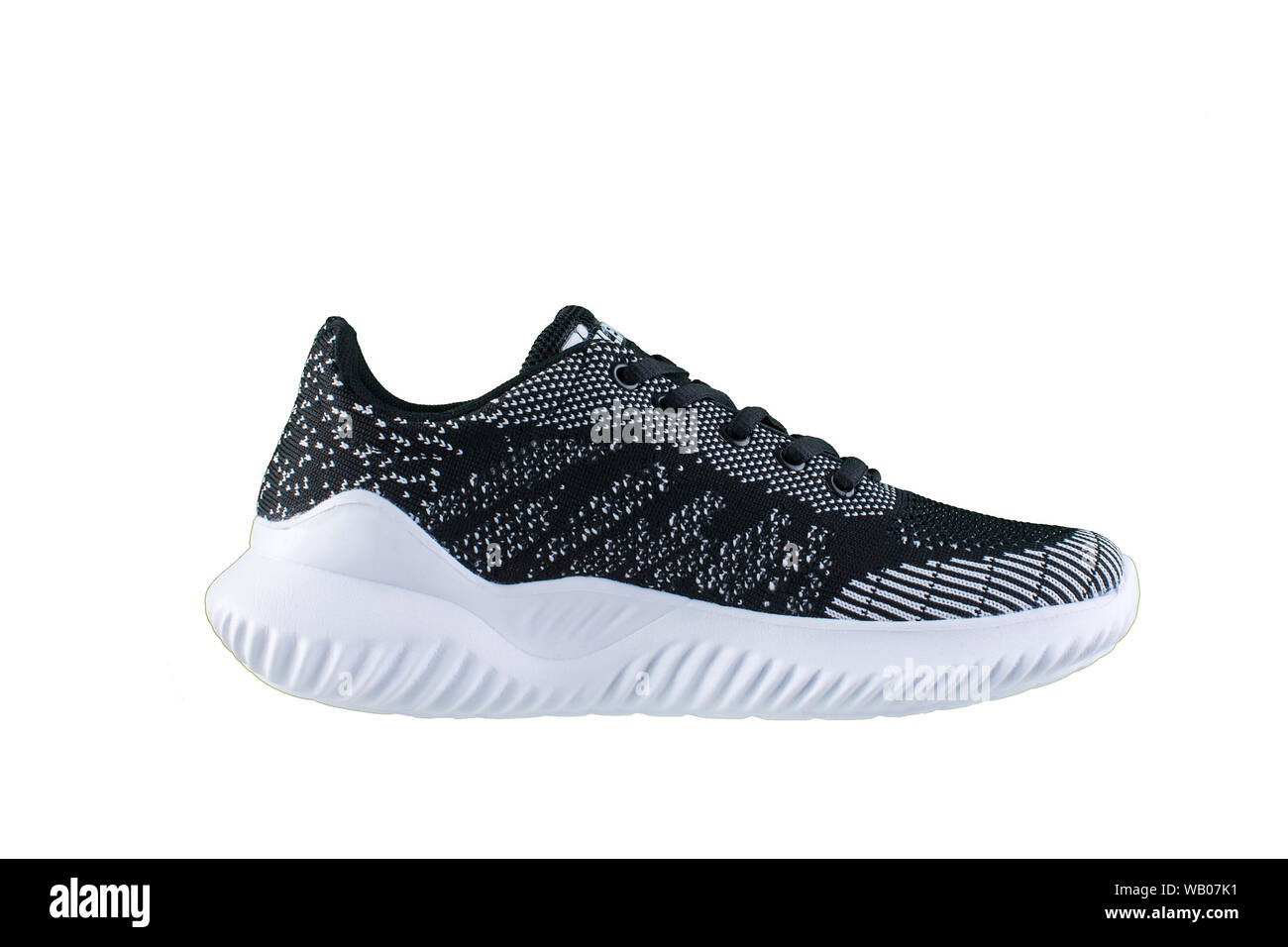 Sneakers. Sports shoes side view on a white background Stock Photo - Alamy