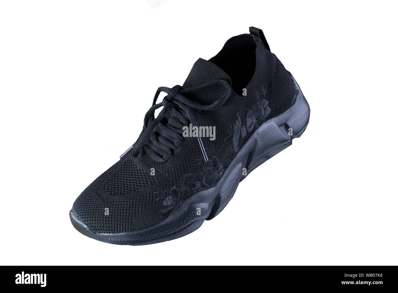 Sneakers. Sports shoes side view on a white background Stock Photo - Alamy