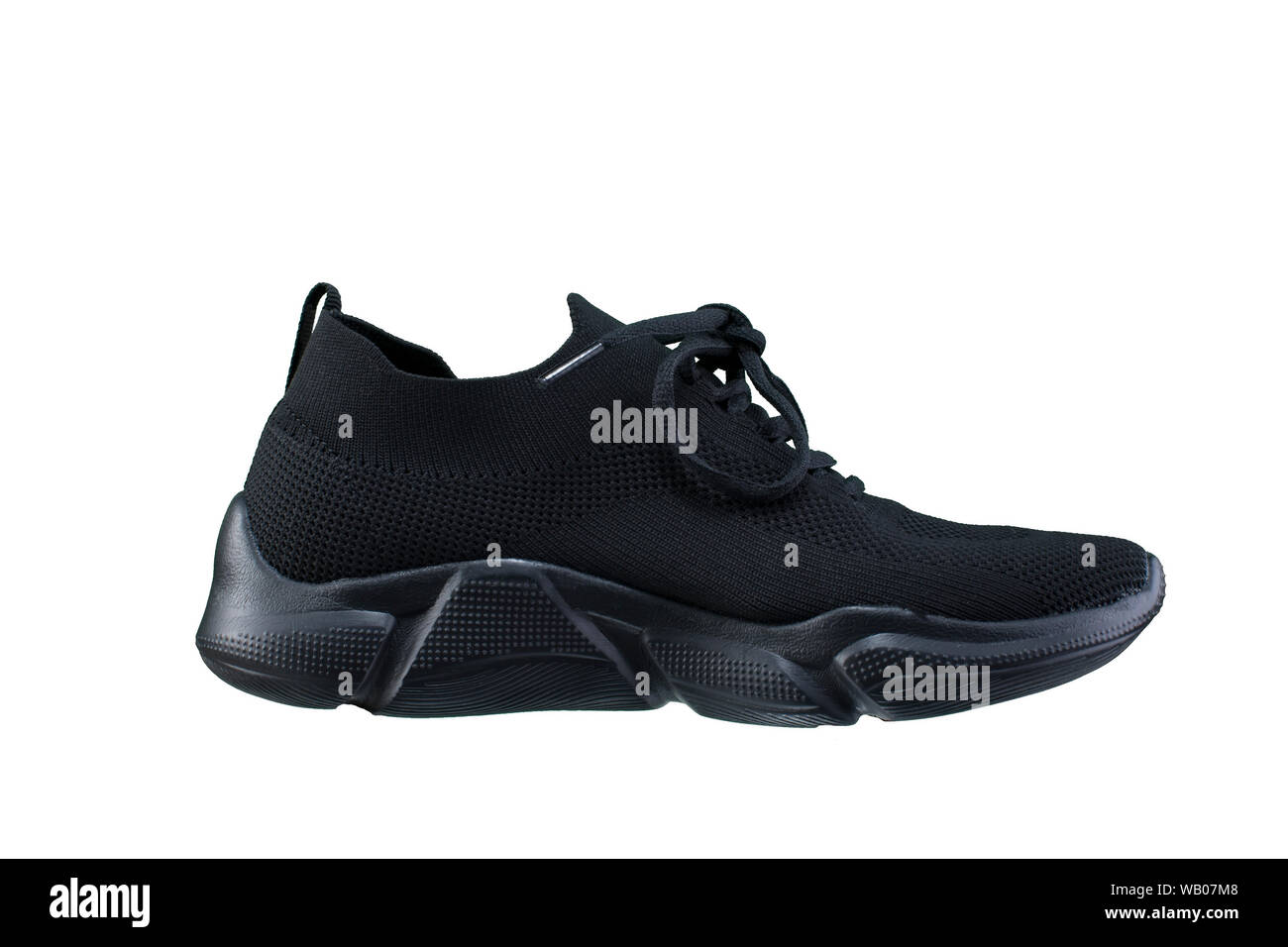 Sneakers. Sports shoes side view on a white background Stock Photo - Alamy