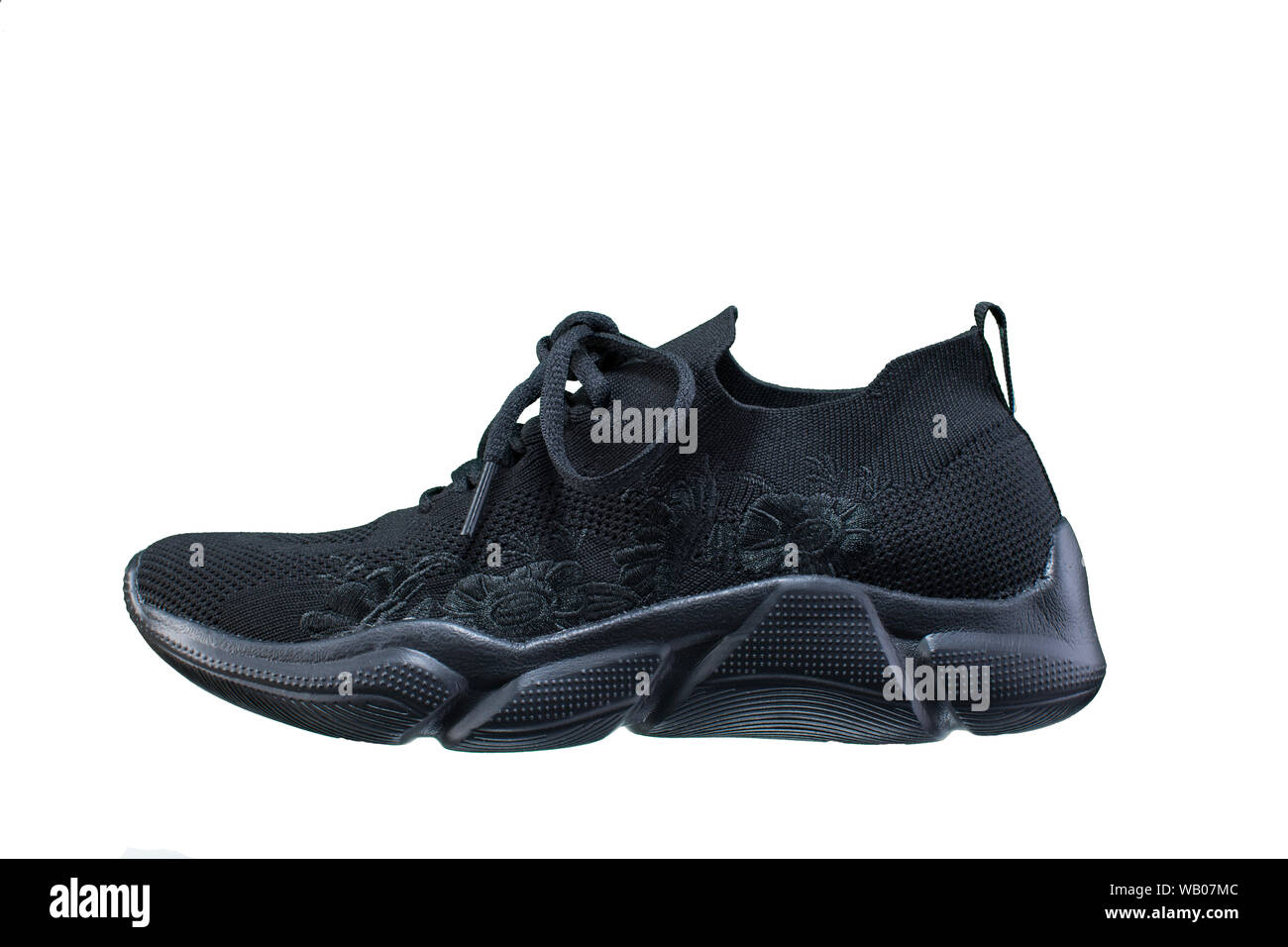 Sneakers. Sports shoes side view on a white background Stock Photo - Alamy