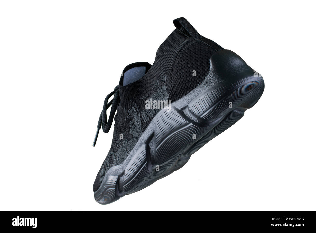 Sneakers. Sports shoes side view on a white background Stock Photo - Alamy