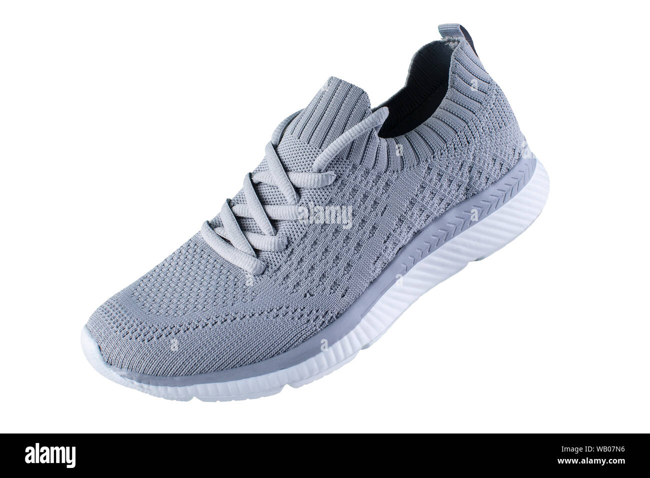Gray sneakers. Sports shoes side view on a white background Stock Photo ...