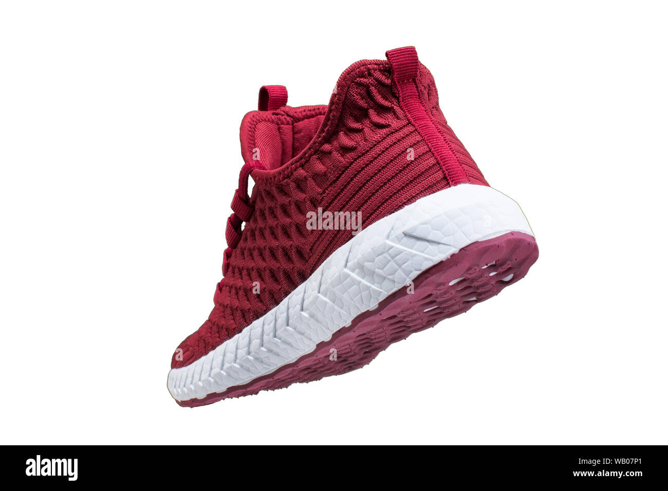 Red sneaker. Sports shoes side view on a white background Stock Photo ...