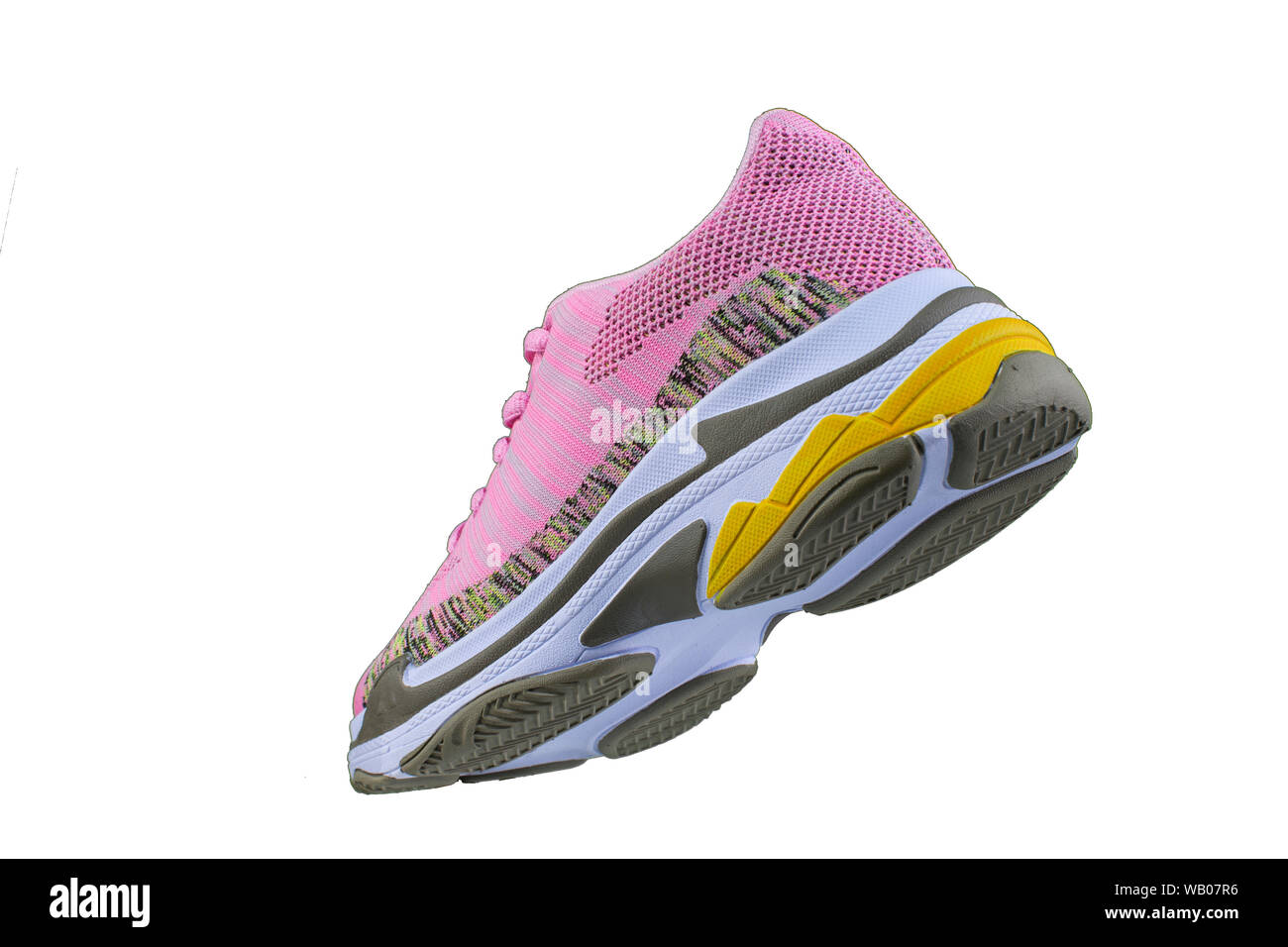Multicolored sneaker. Sports shoes side view on a white background ...