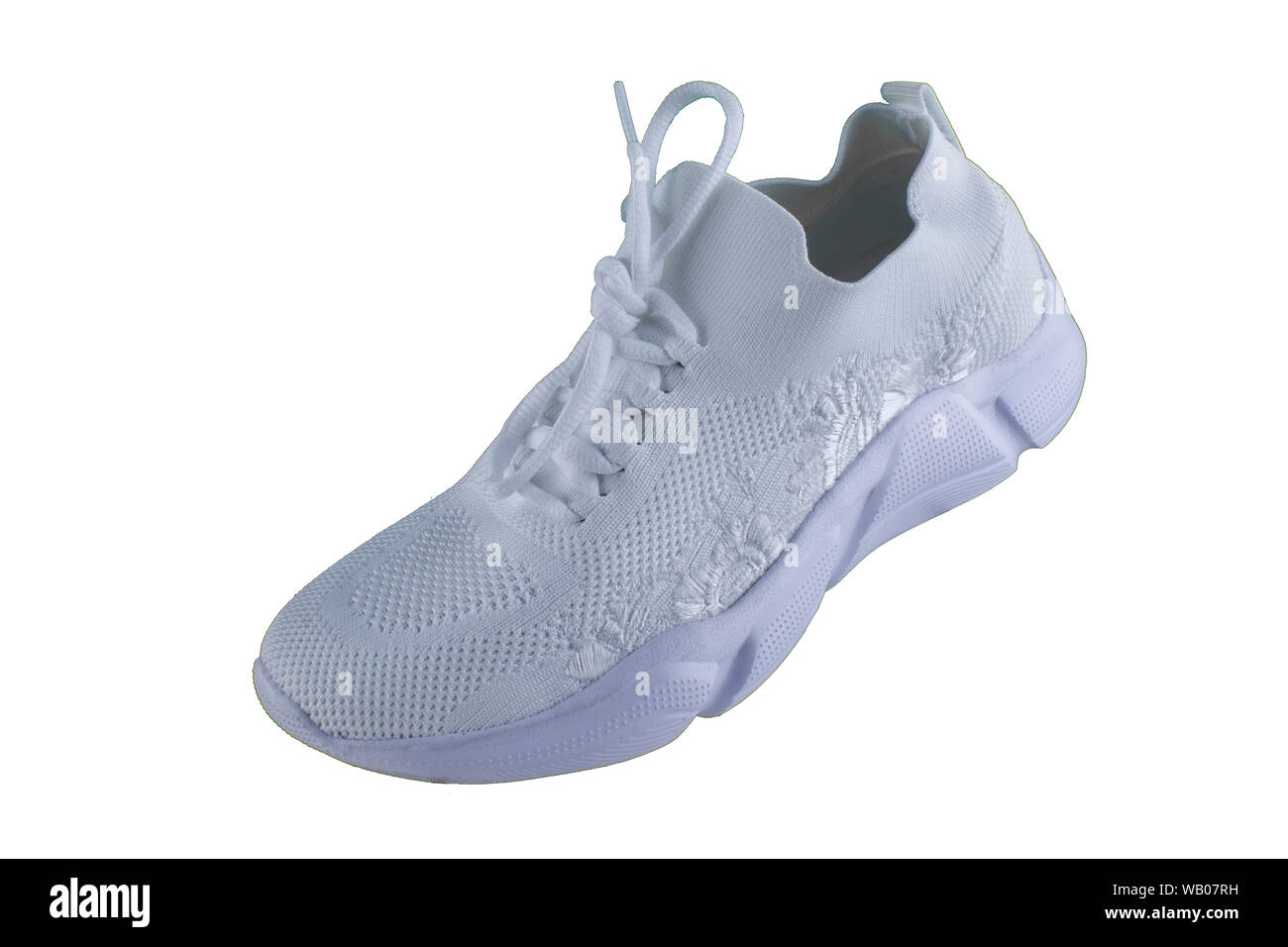 White sneaker. Sports shoes side view on a white background Stock Photo ...