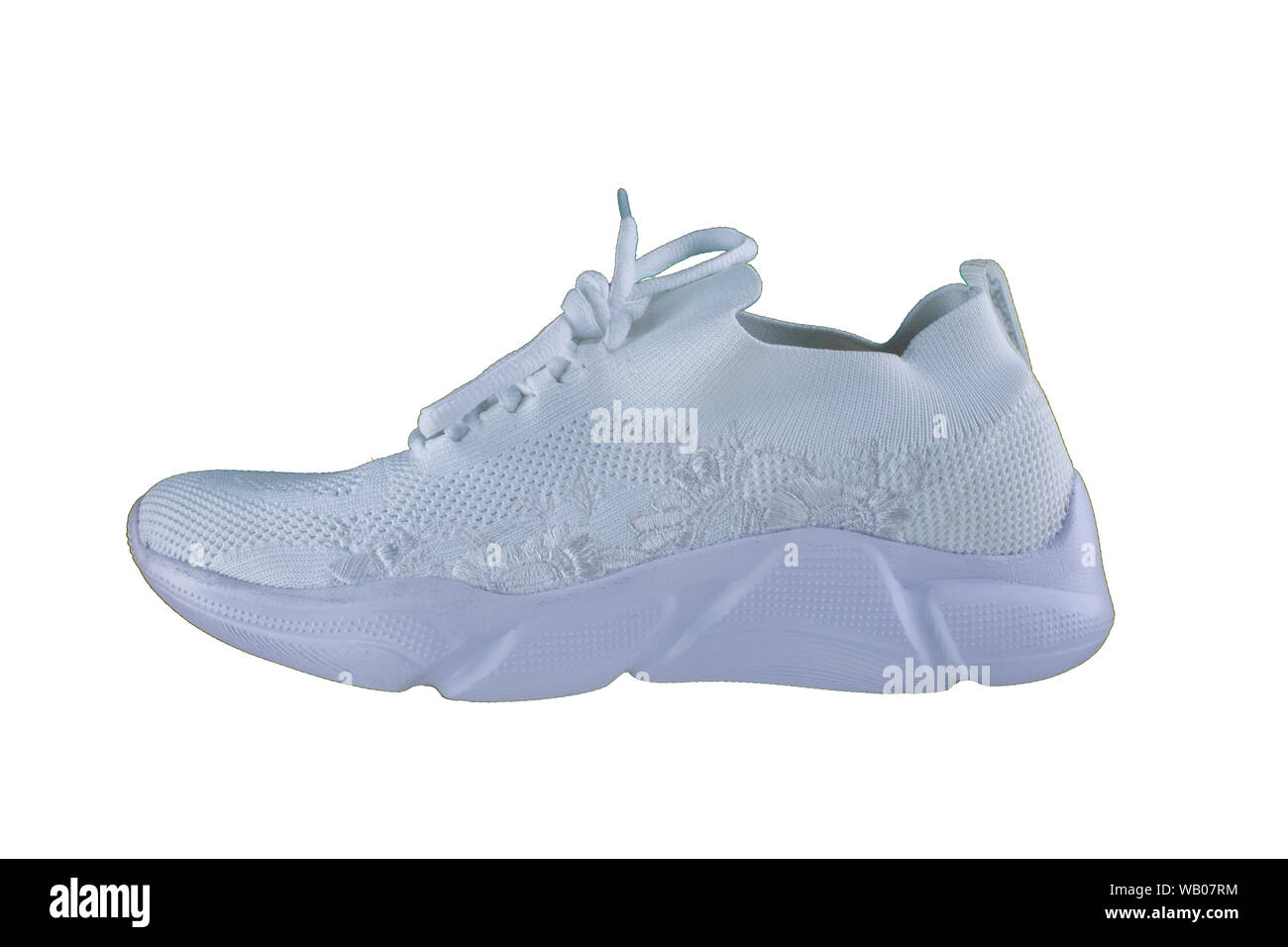 White sneaker. Sports shoes side view on a white background Stock Photo ...