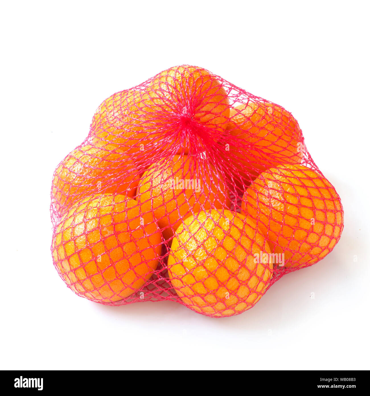 Oranges In A Net Isolated On White Stock Photo - Alamy
