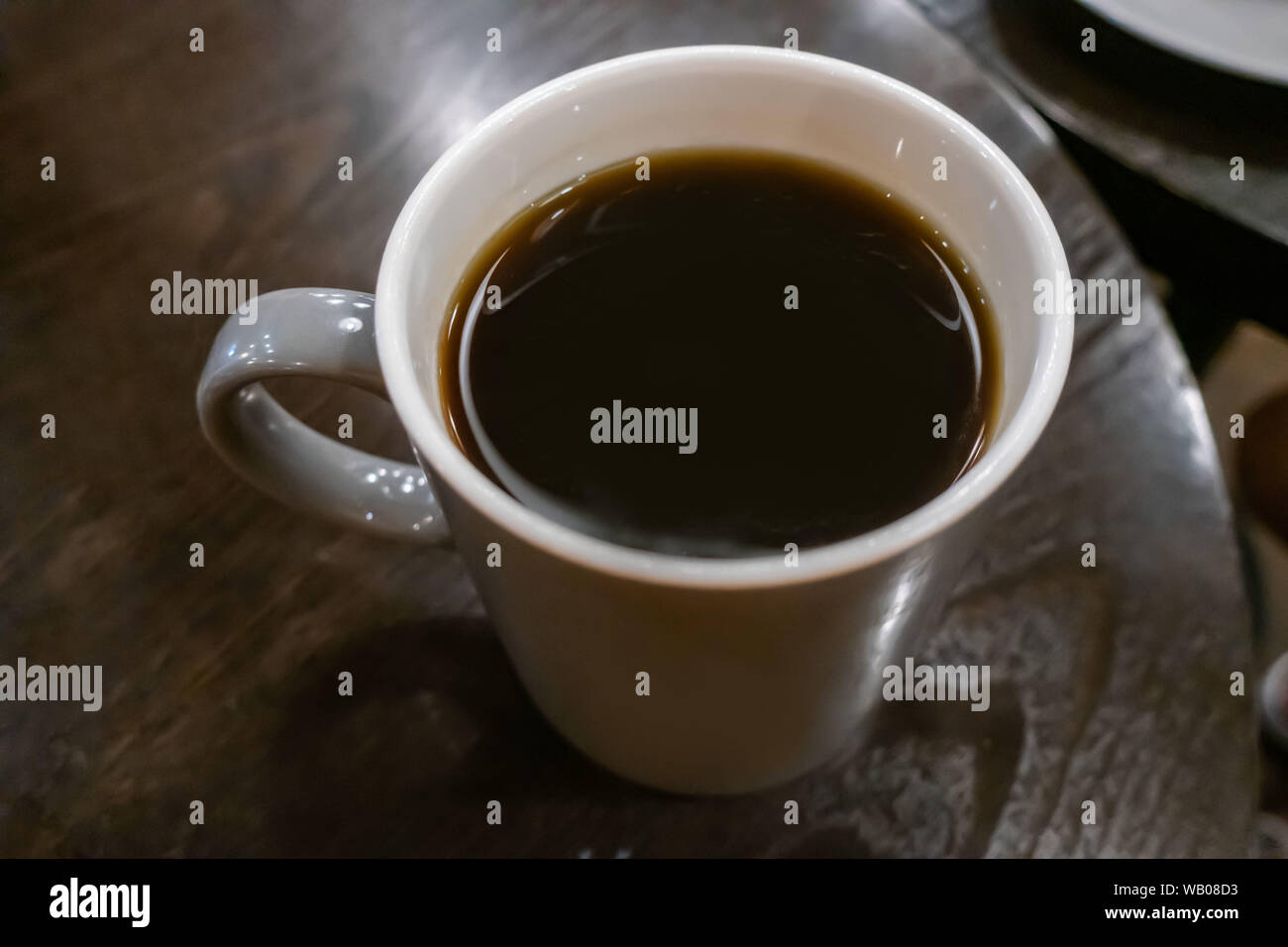 Coffee mug in a coffee shop Stock Photo - Alamy