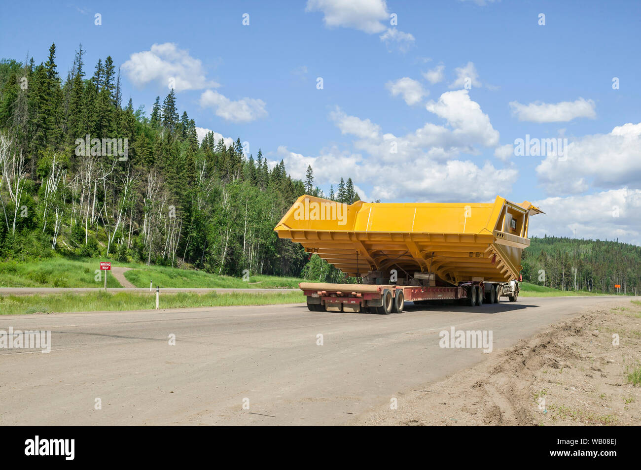 Transportation of Caterpillar 797B Giant Truck bed on highway 63 north ...