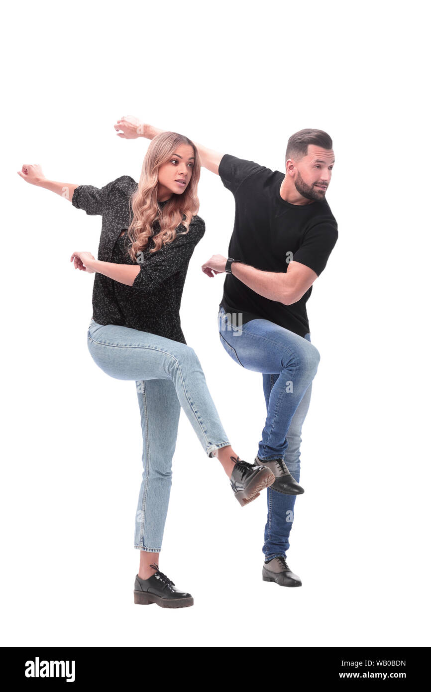 side view. happy young couple dancing together Stock Photo - Alamy