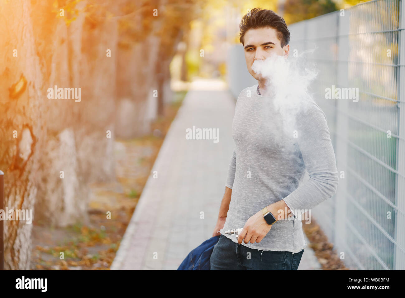 Walking vaping hi-res stock photography and images - Alamy