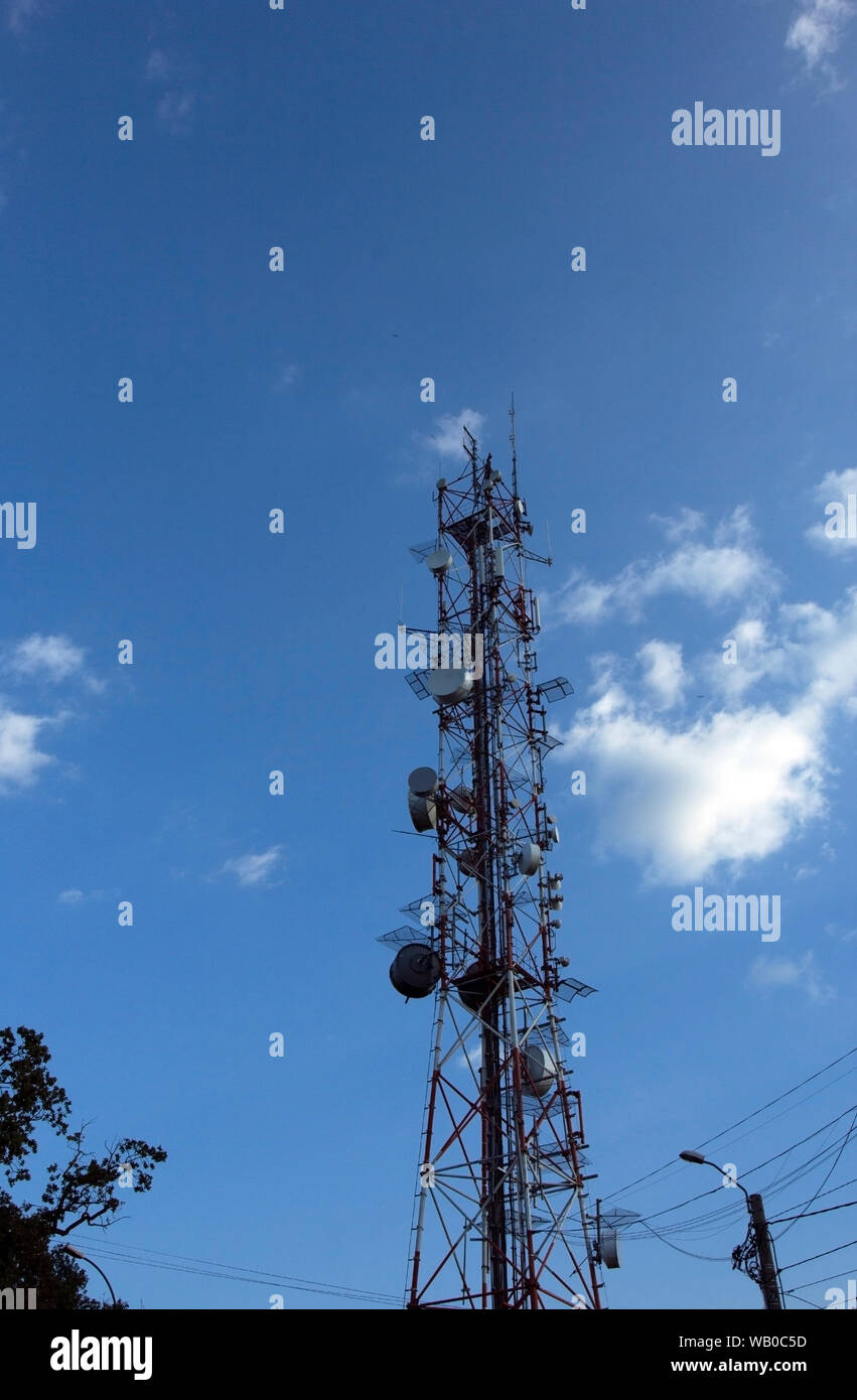Telecommunication tower, cell antenna, transmitter, cell phone tower, telecom radio tower over a ...