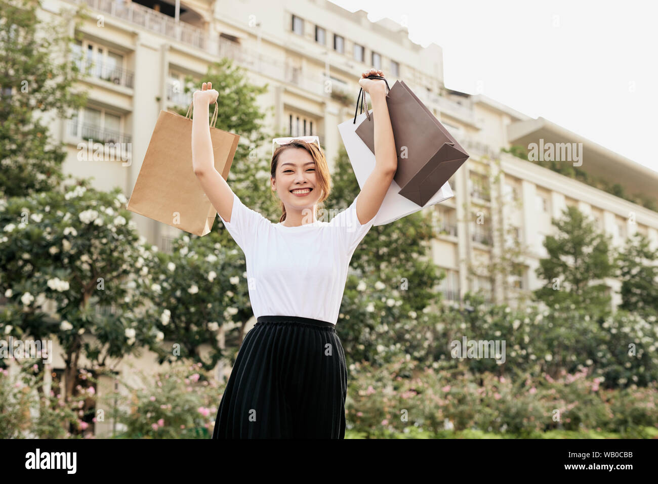 Shopaholic woman hi-res stock photography and images - Alamy
