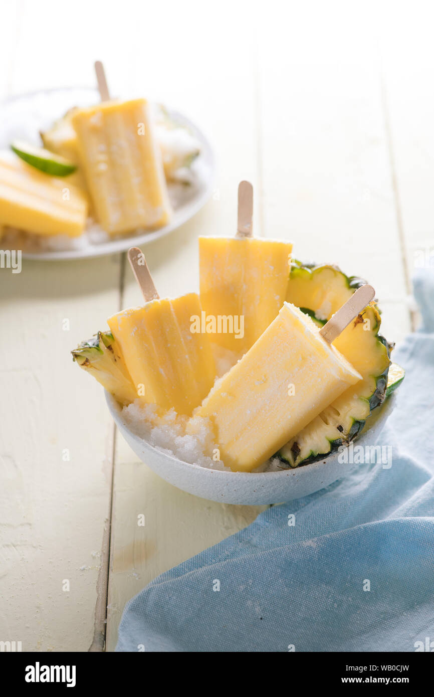 Homemade ice cream or popsicles from pineapple decorated. Top view ...