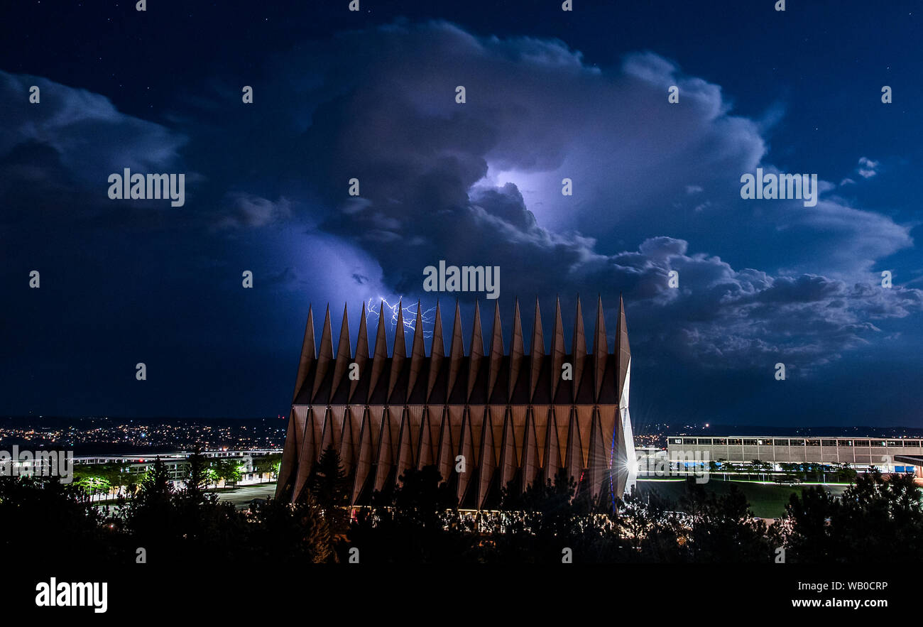 U.S. AIR FORCE ACADEMY, Colo. -- Lightning illuminates the structure of ...