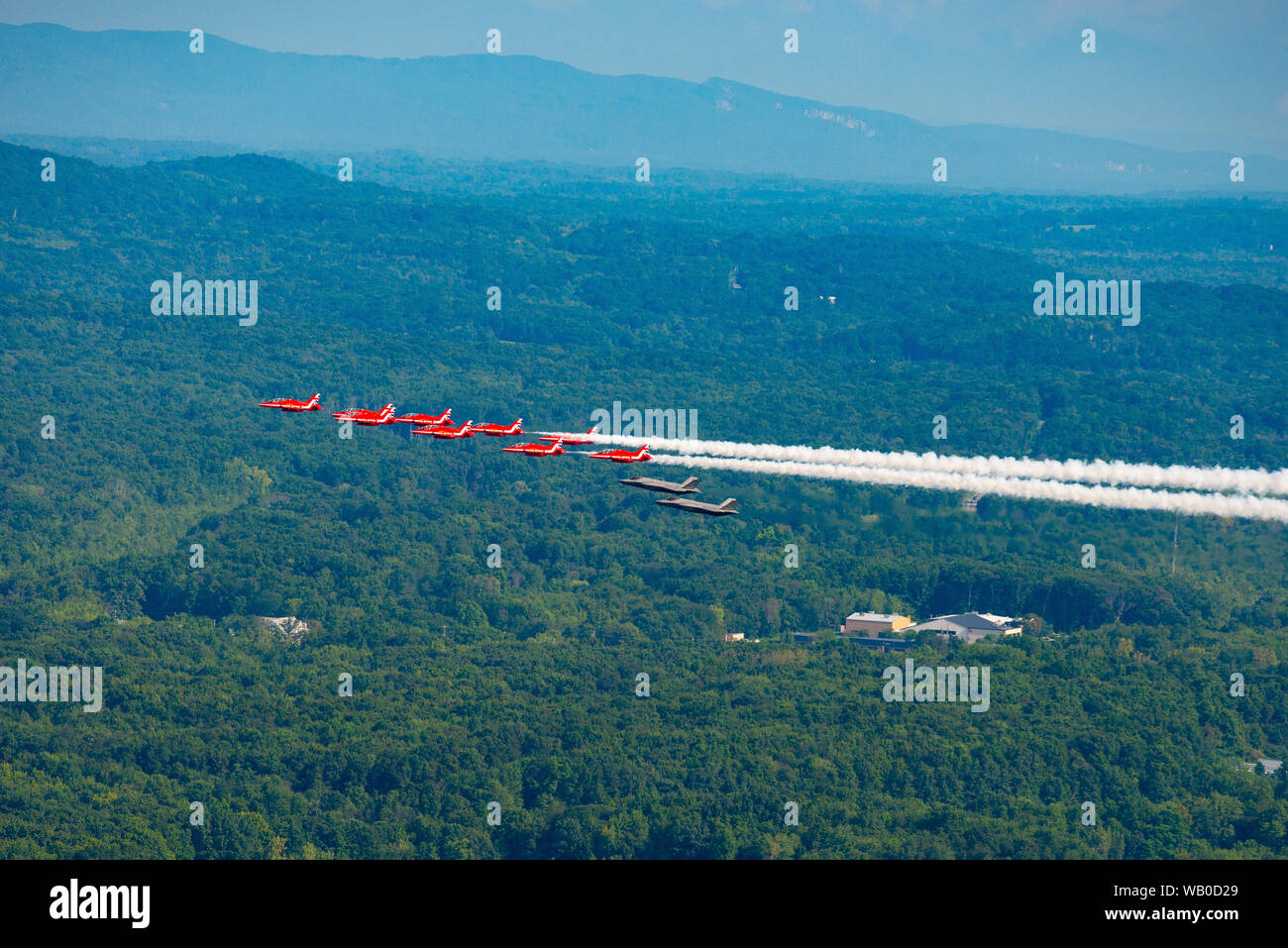 A multinational aerial formation flies over the U.S. Military Academy ...