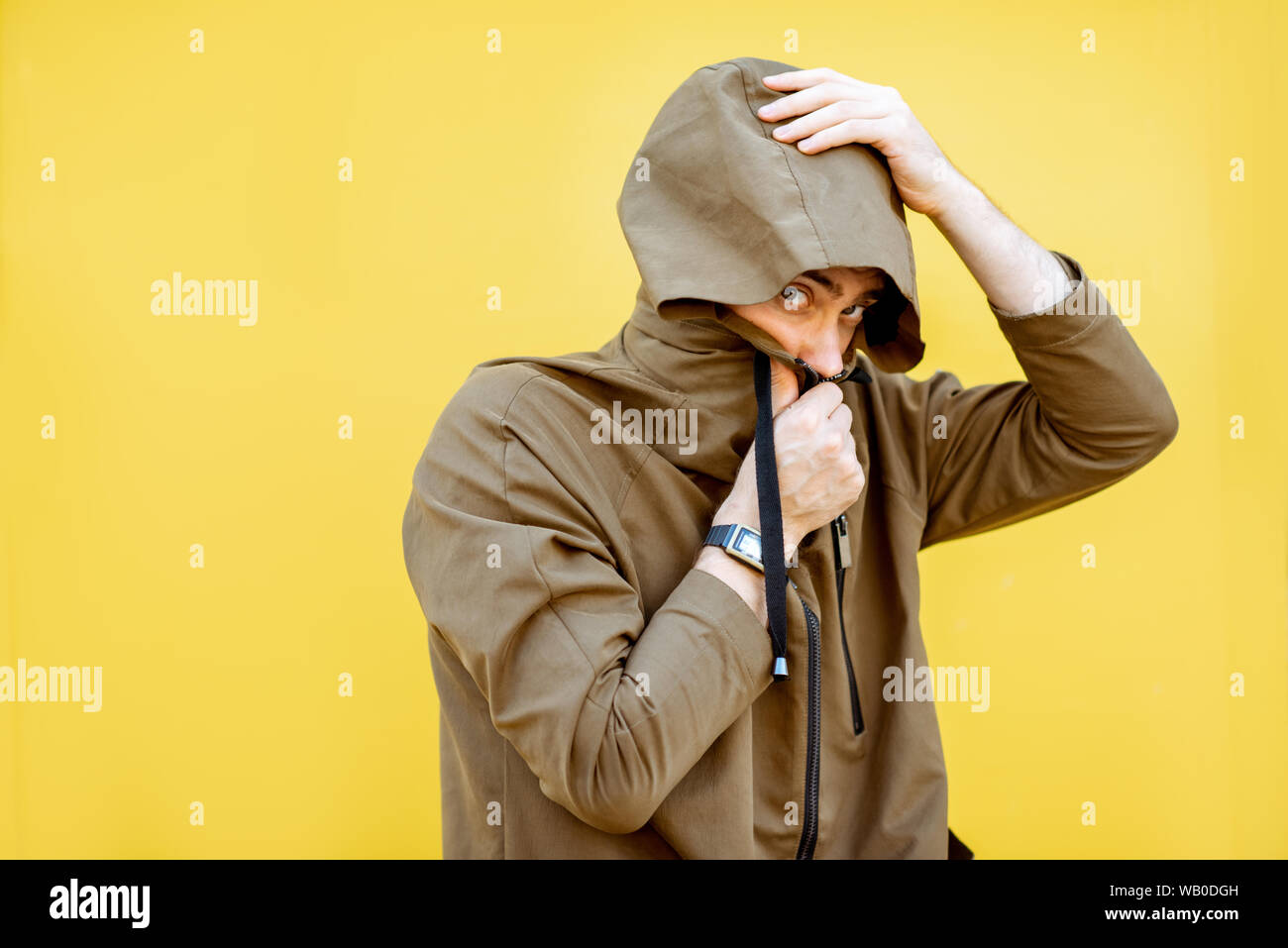 Portrait of a mysterious and weird man wearing hoodie coat on the ...