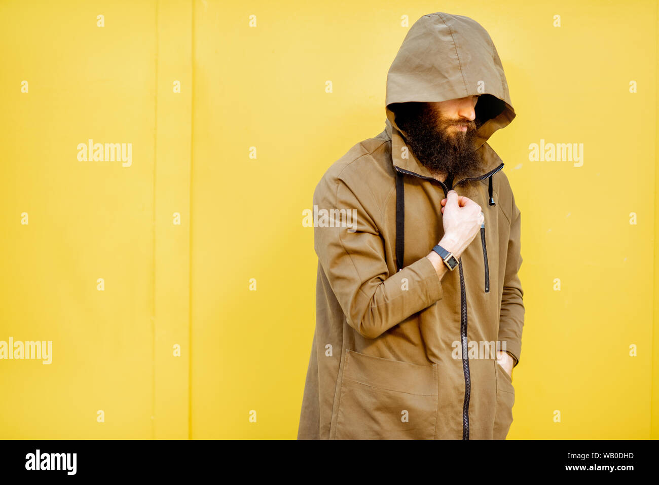 Portrait of a mysterious and weird man wearing hoodie coat on the ...