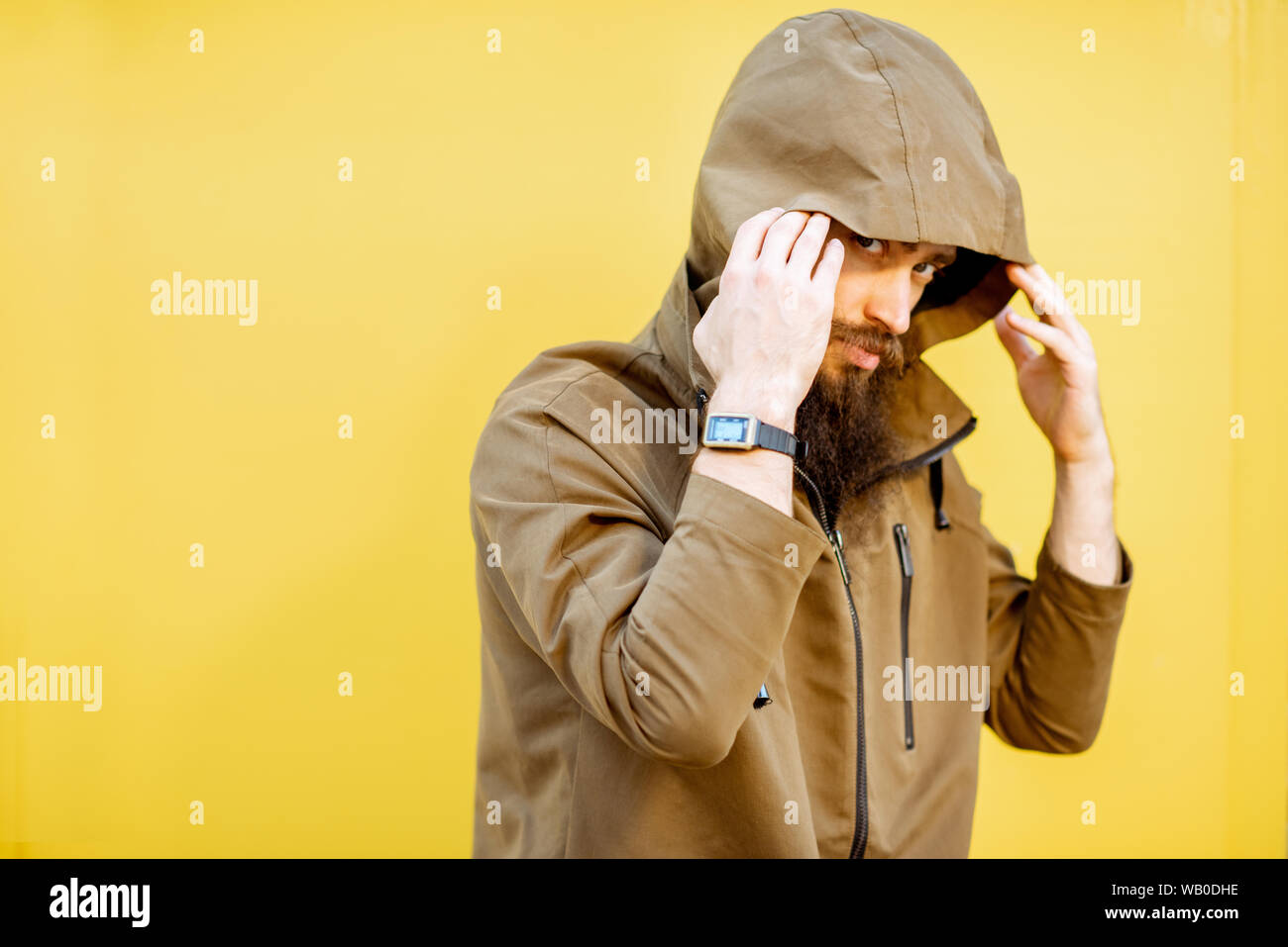 Portrait of a mysterious and weird man wearing hoodie coat on the ...