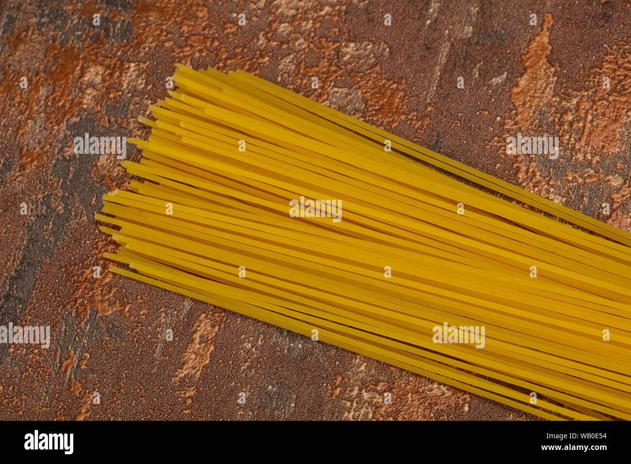 Dry raw spaghetti ready for bowling Stock Photo - Alamy