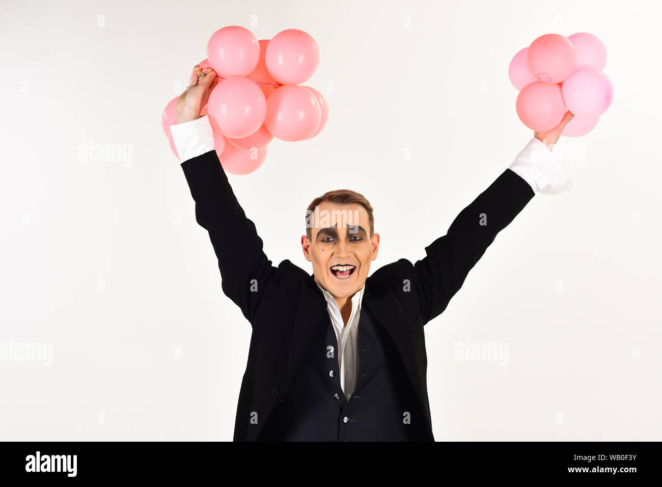 Best day ever. Balloon artist. Holding festive celebration. Mime man ...